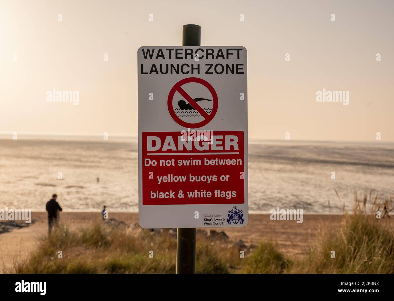 Danger sign prohibiting swimming in the watercraft launch zone on ...
