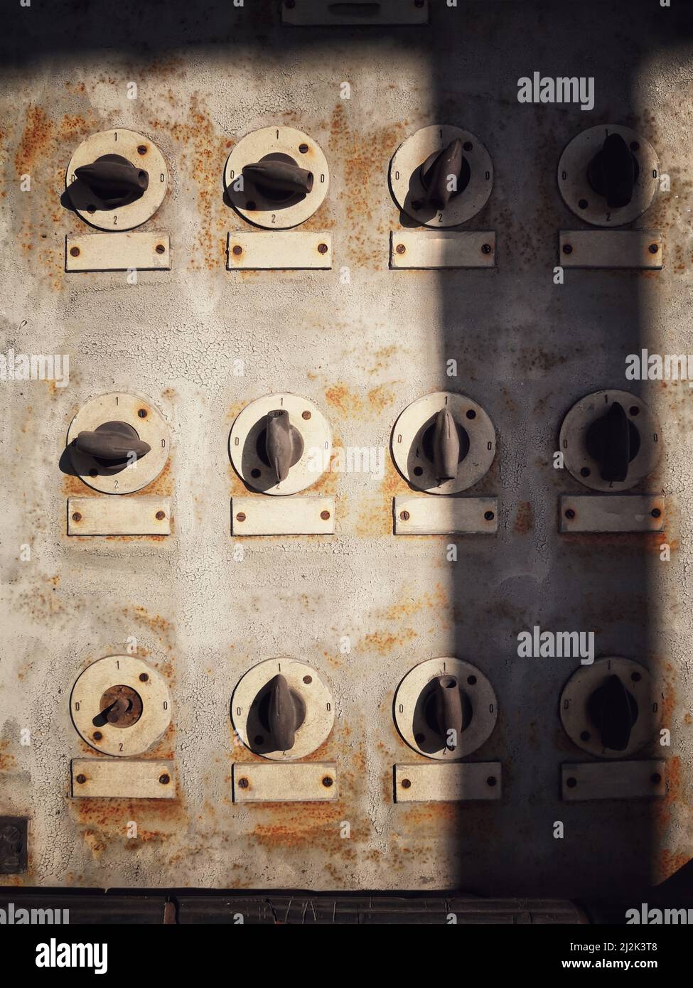 Vintage switch control panel with many buttons in factory manufacturing ...