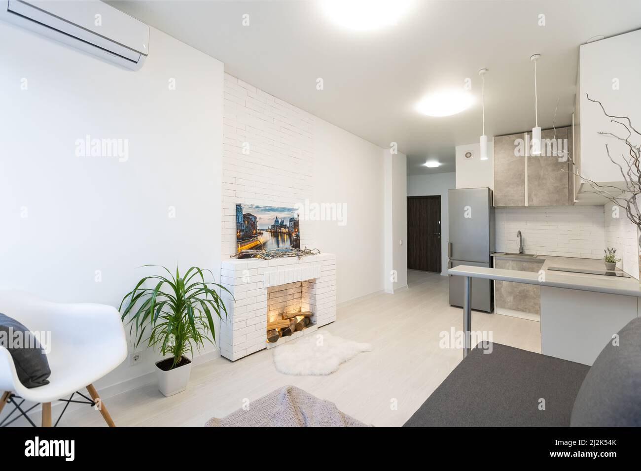 Studio interior with fireplace. The interior of a small country house ...