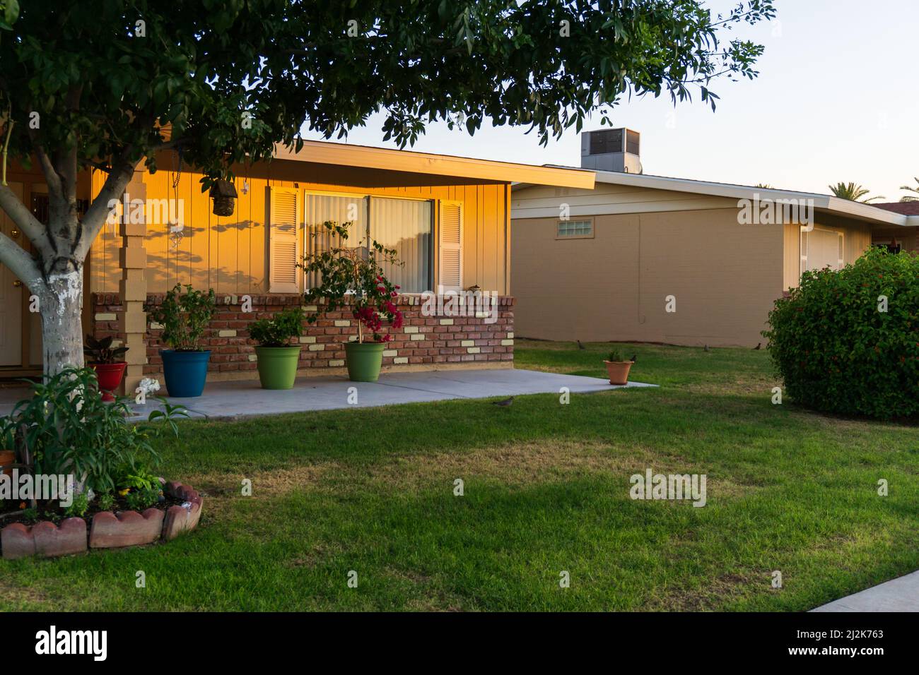 Front exterior with window of a mid-century modern home in Sun City ...