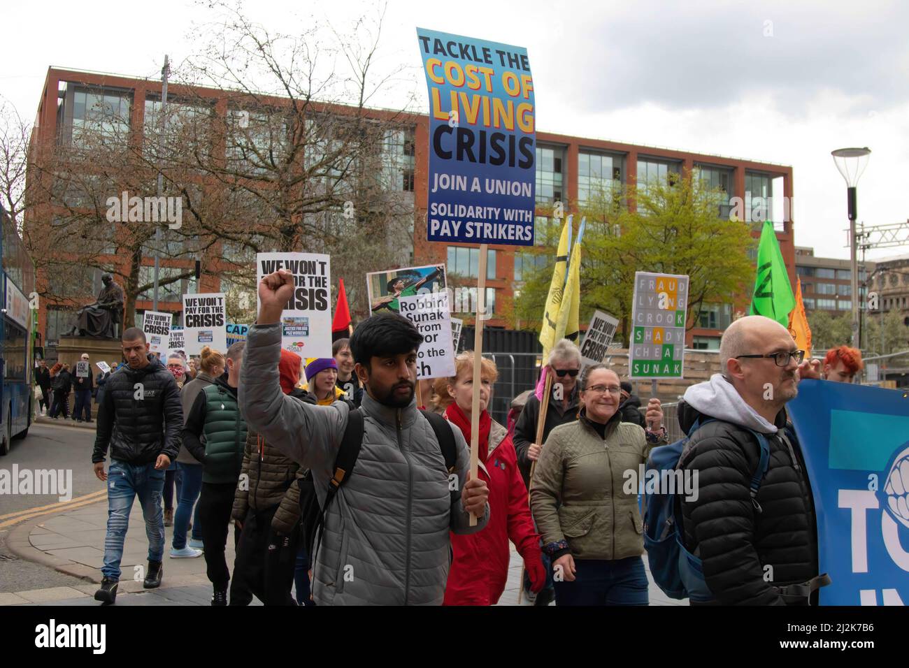Protesters hold signs expressing their opinion during the demonstration ...