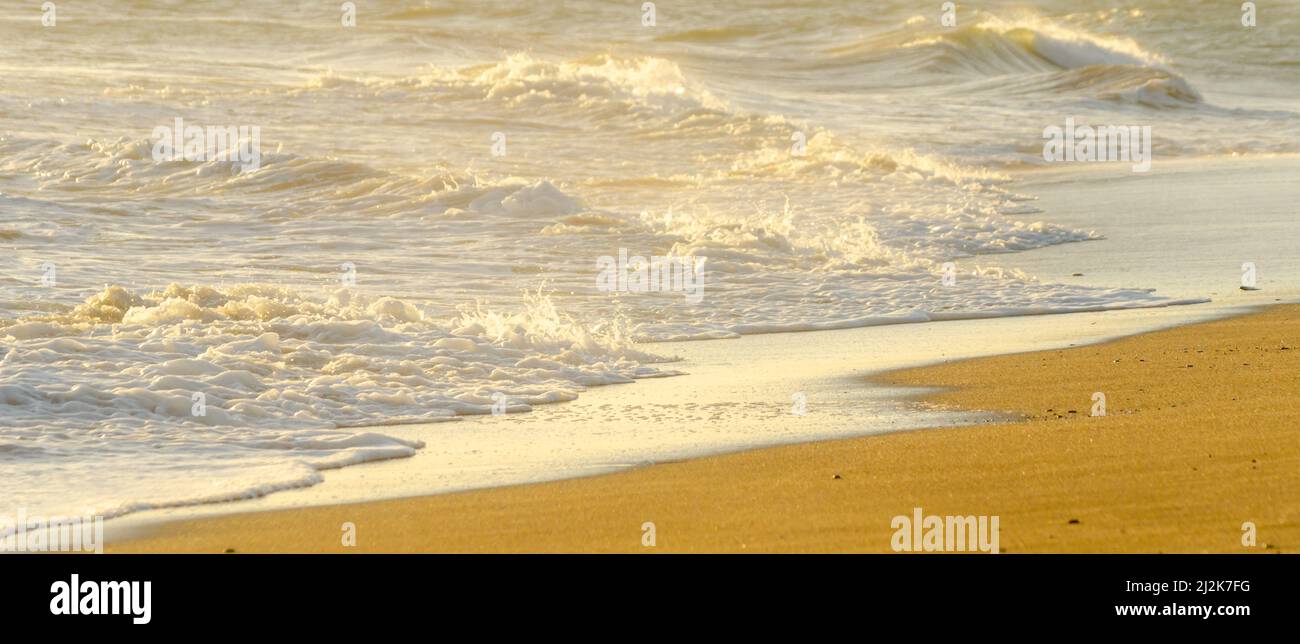 View on the seawater affecting the sand on the beach, sea waves flowing ...