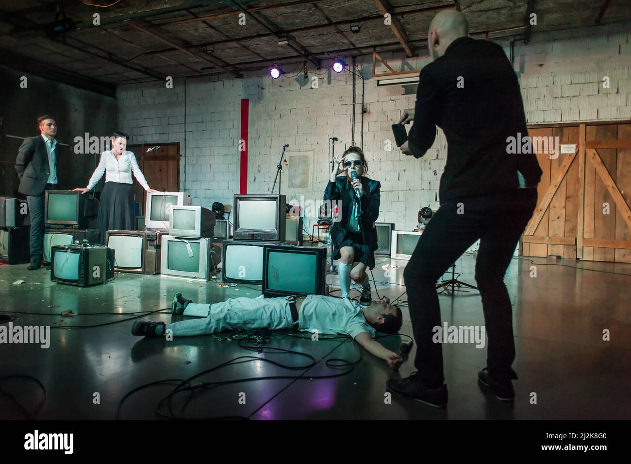 Large group of theater actor artists on stage perform play for audience ...