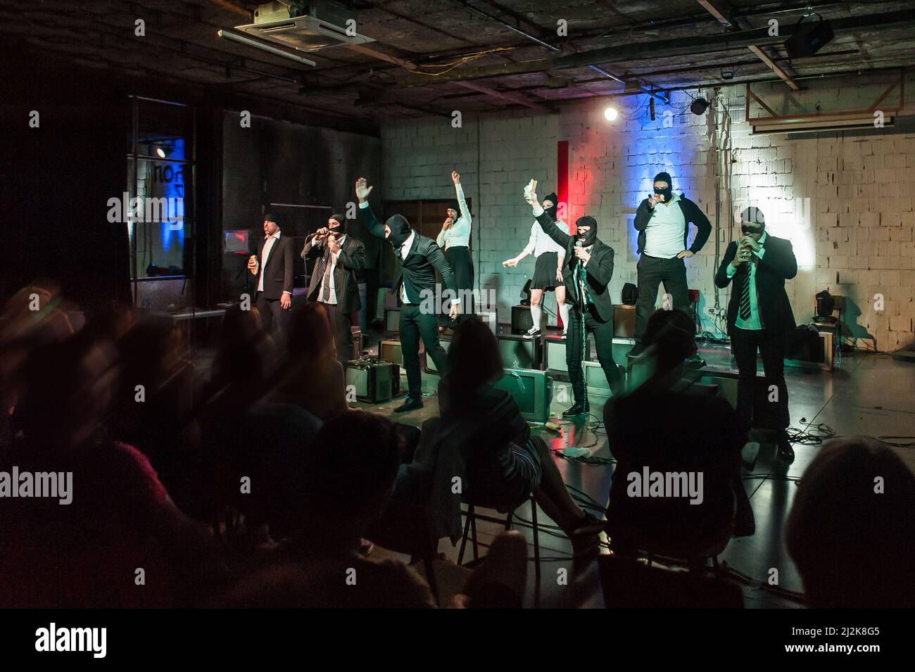 Large group of theater actor artists on stage perform play for audience ...