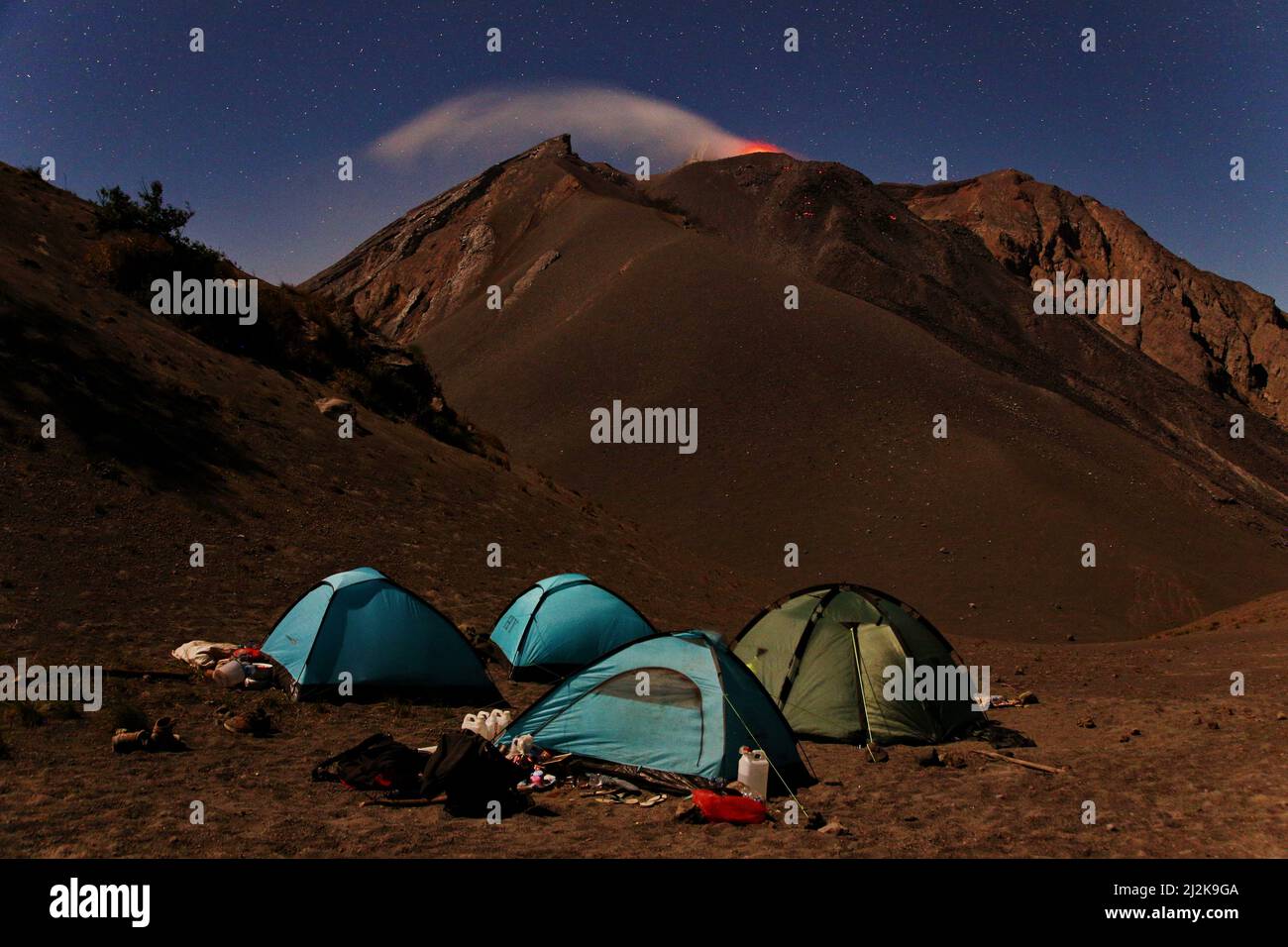 Camping under the active cone of Sangeang Api volcano in Sumbawa ...