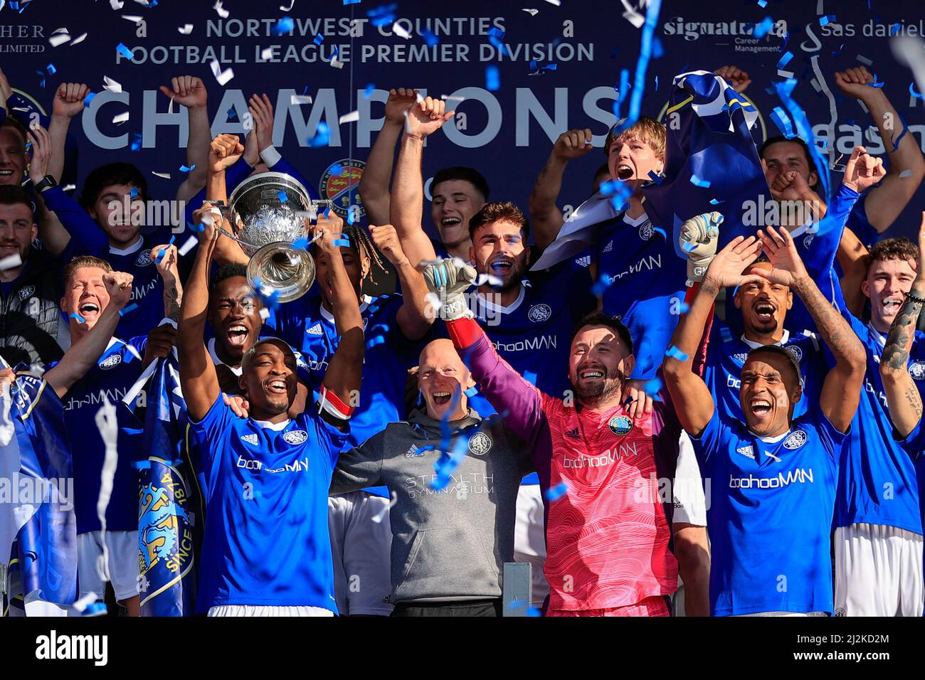Macclesfield FC players and team manager Danny Whittaker lift the North ...