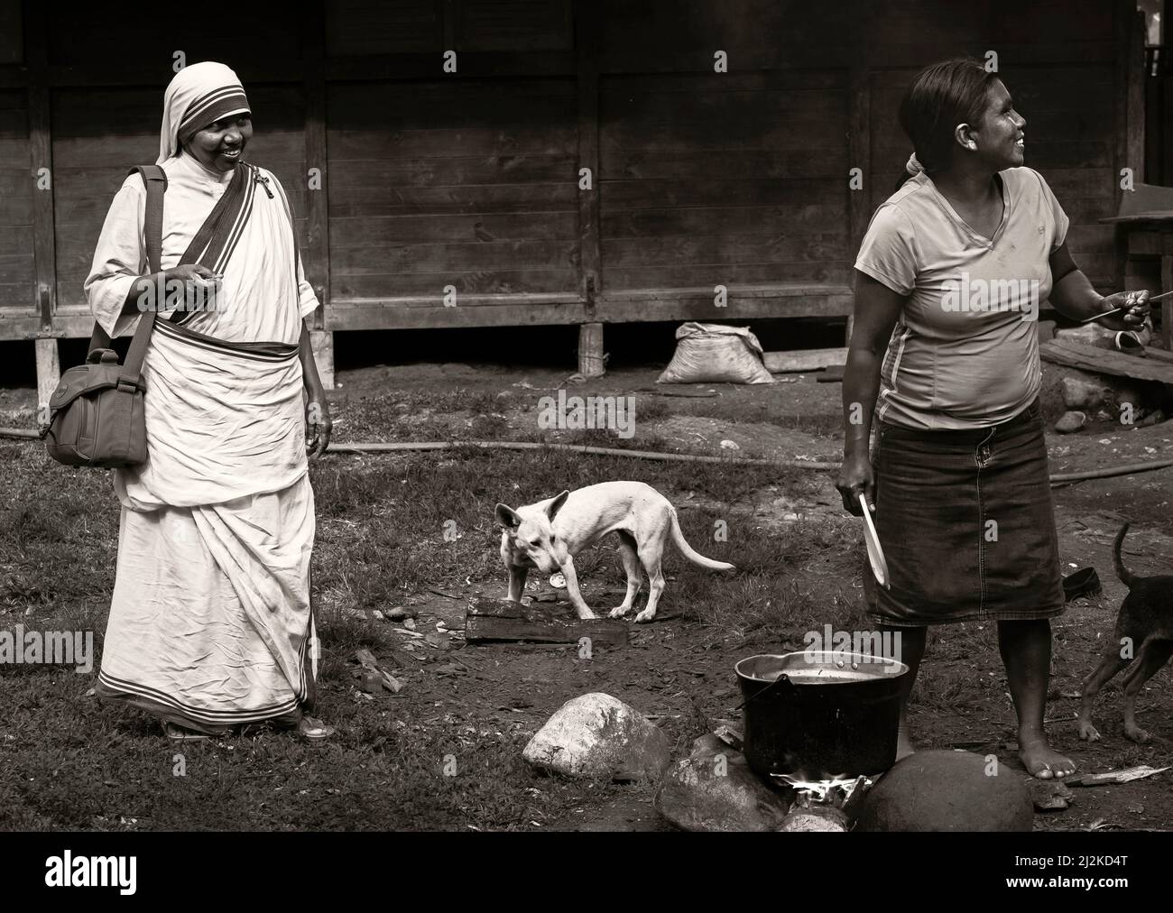 Cabecar indigenous woman cooking on open flame while Mother Teresa ...
