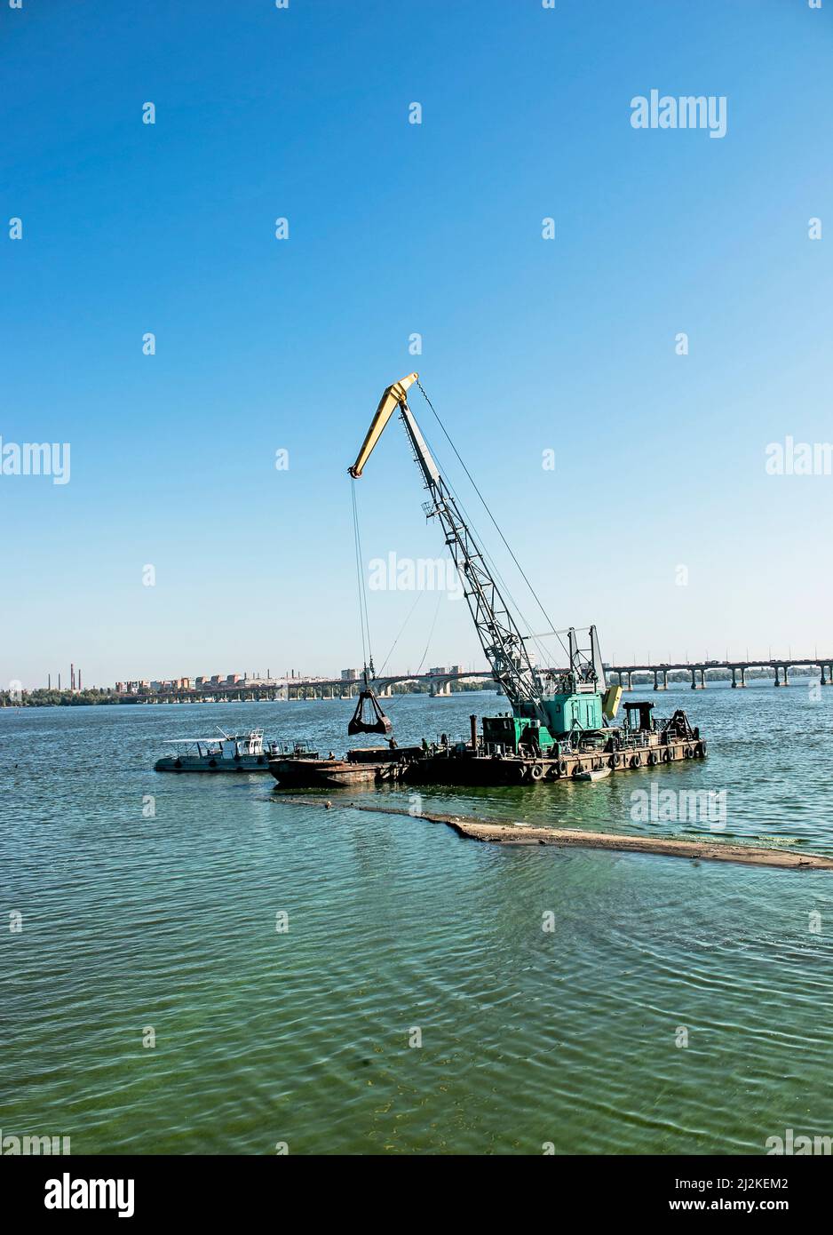 Cleaning the newly formed island from industrial waste on the Dnieper ...