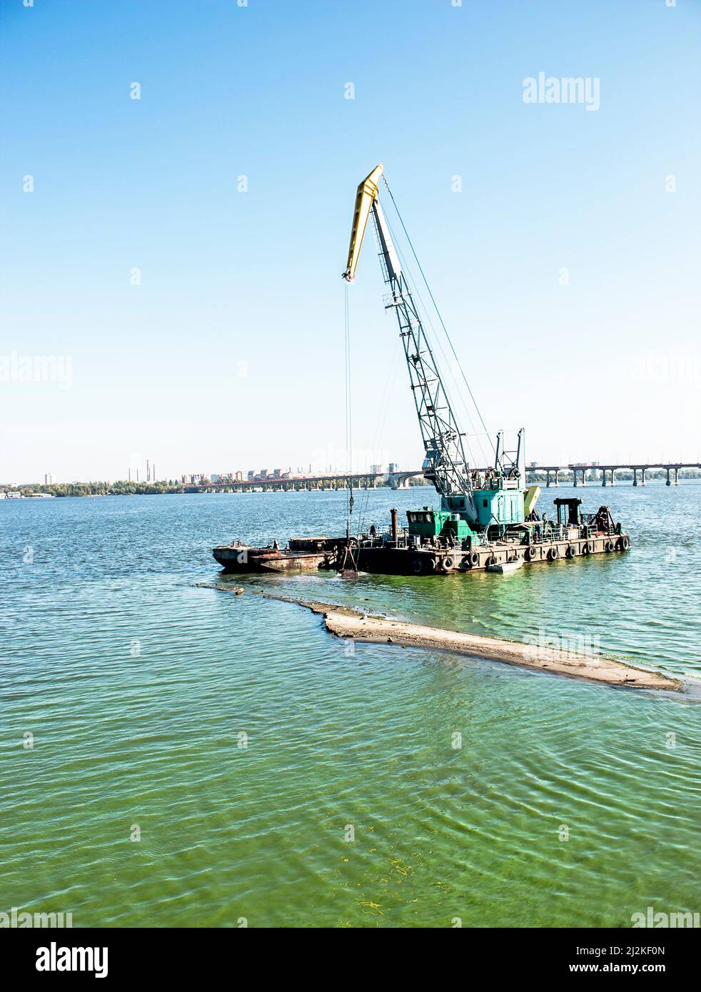 Cleaning the newly formed island from industrial waste on the Dnieper ...