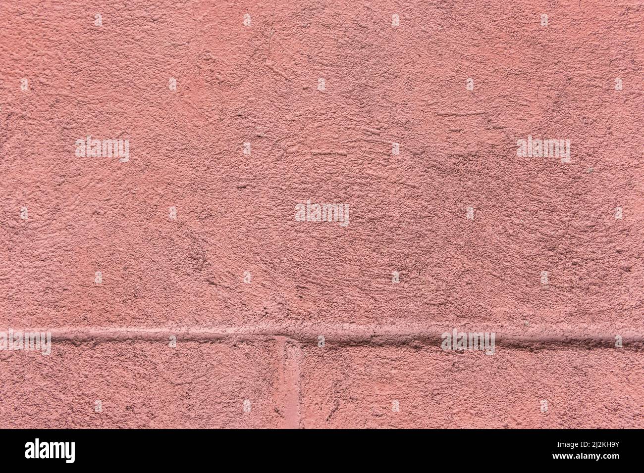 Painted color stone concrete cement facade of brick blocks wall ...