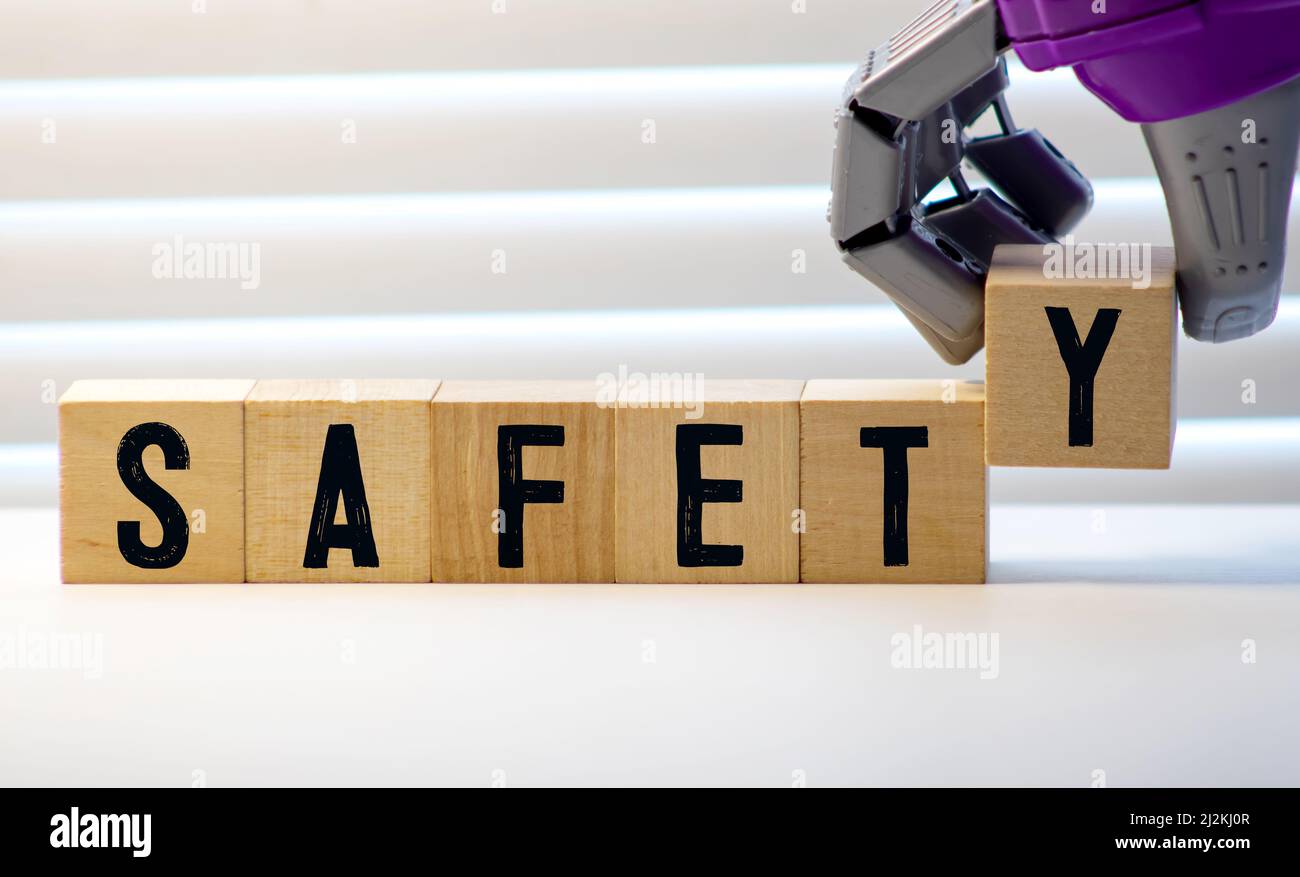 safety word written on wood block. safety text on wooden table for your ...
