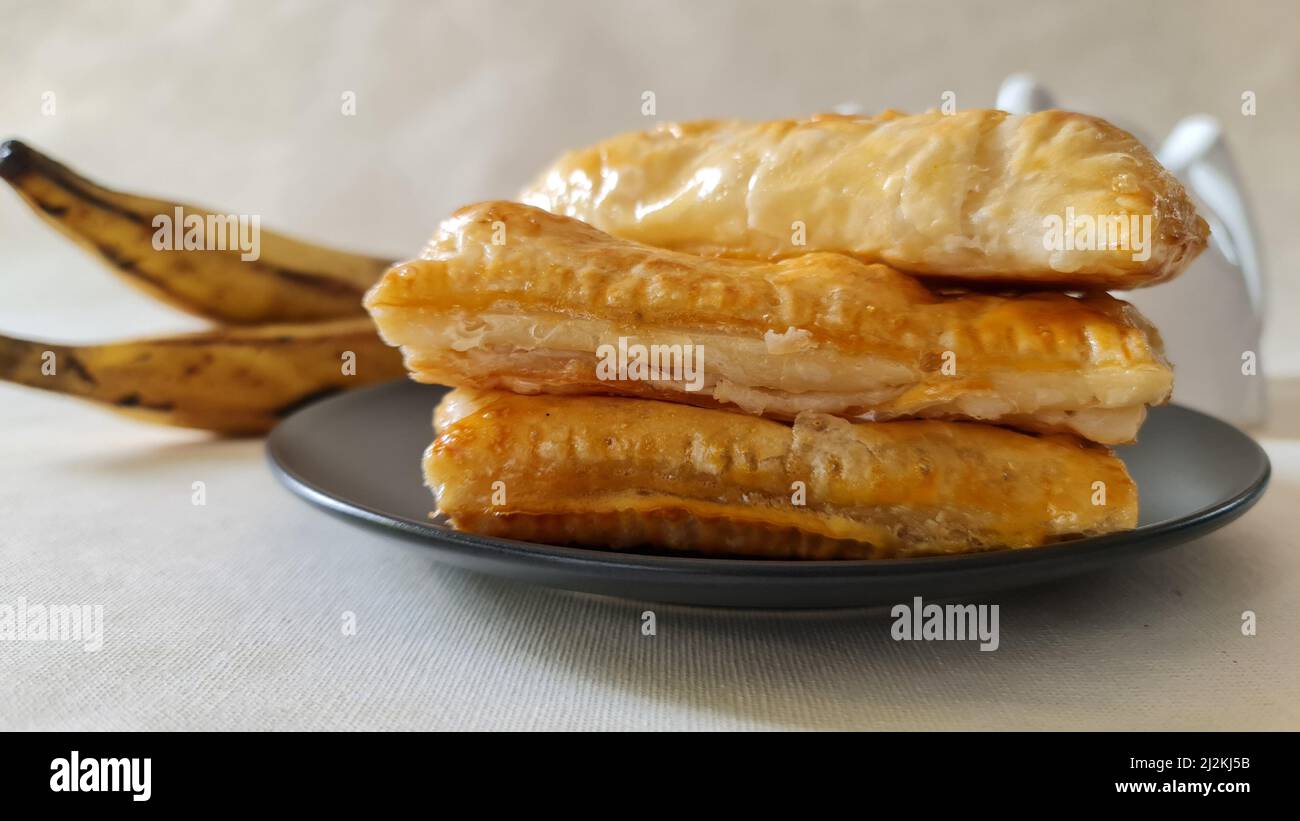 Home baked sweet plantain puffs made with ripe plantain and store ...