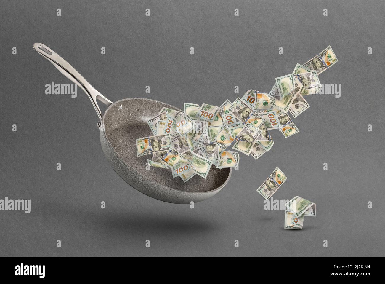 Rising food prices. The concept of rising cost of food. Money in a pot ...