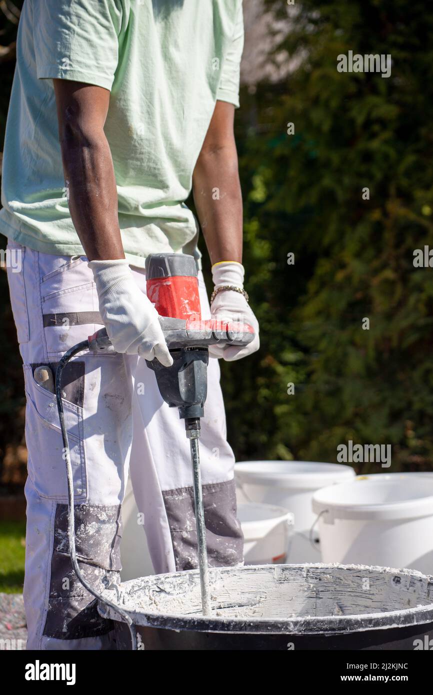Mixing plaster hi-res stock photography and images - Alamy