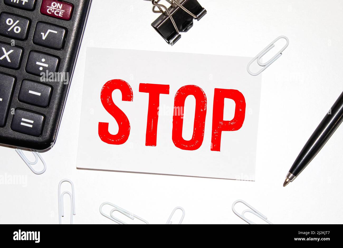 The word STOP written on white paper Stock Photo - Alamy