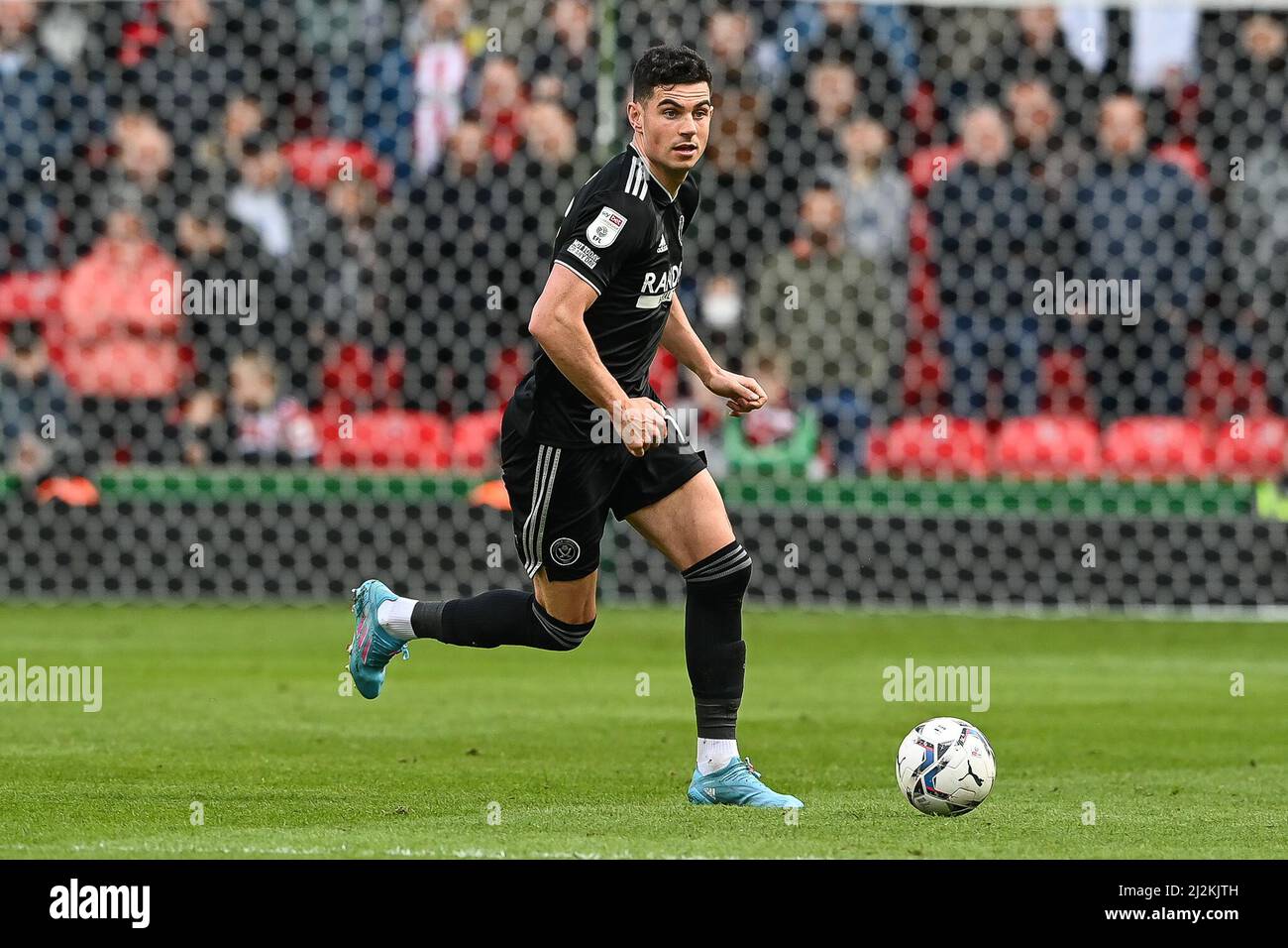John Egan #12 of Sheffield United makes a break with the ball Stock ...