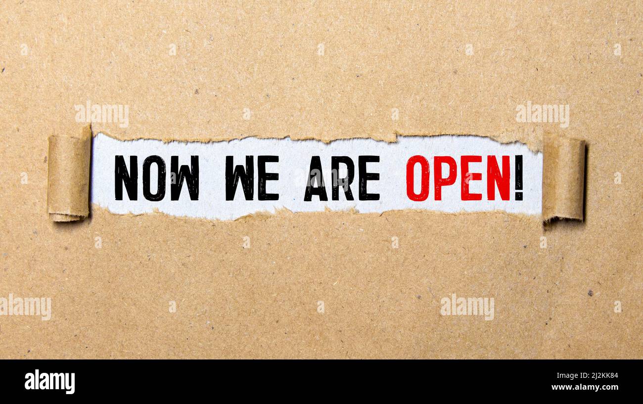 Business concept - we are open on sticky note pasted on keyboard. Top ...