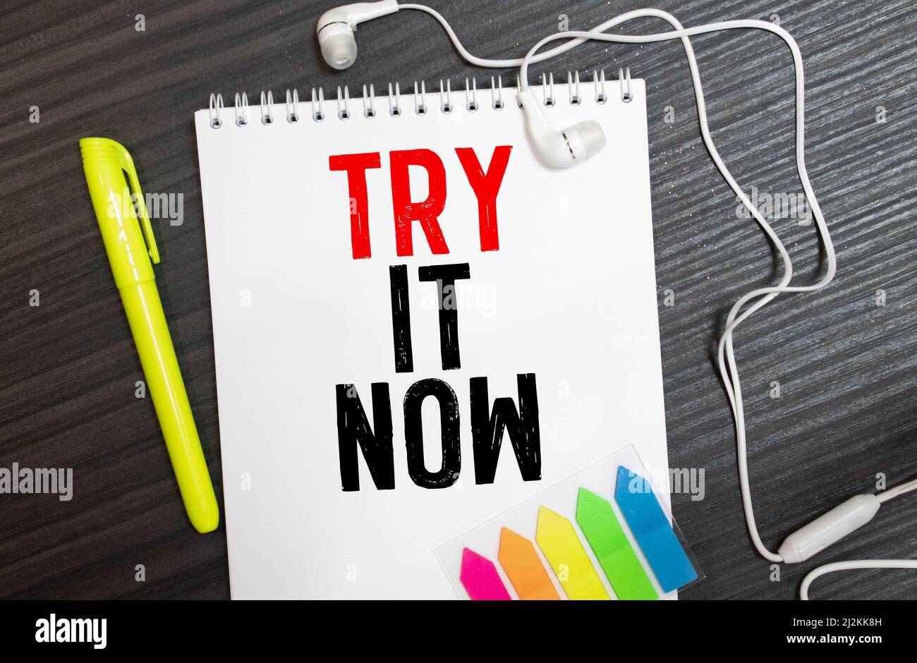 try it now text write on paper, concept Stock Photo - Alamy