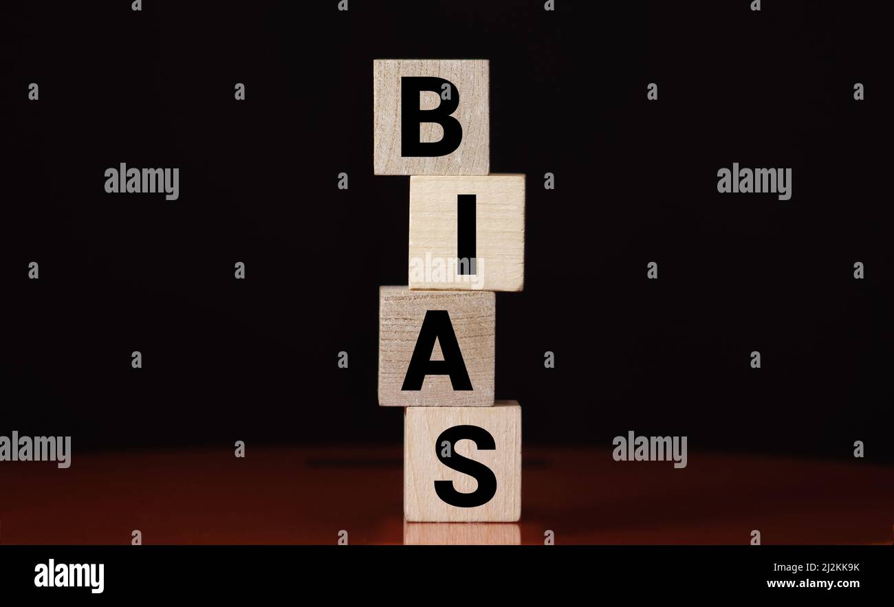 Wooden blocks with the word Bias. Prejudice. Personal opinions ...