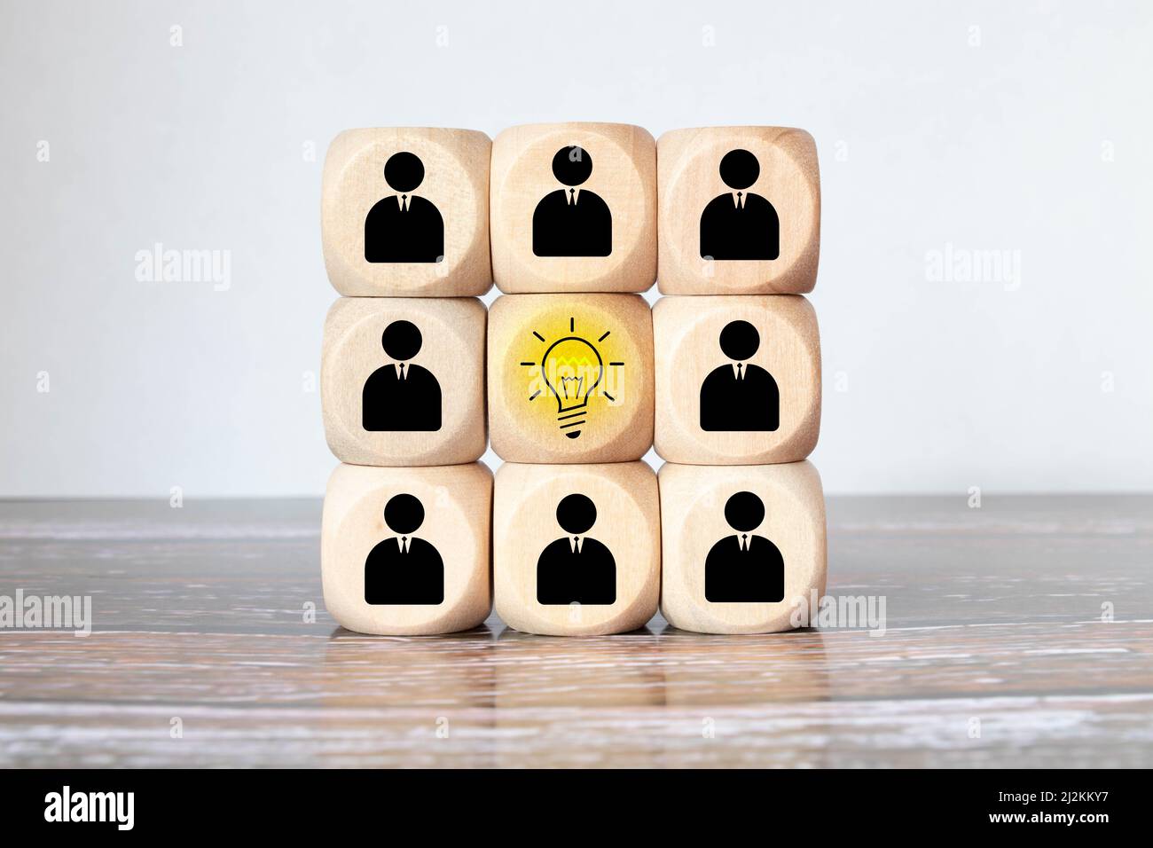 Concept creative idea and innovation. Wooden cube block flip over with head human symbol and ...