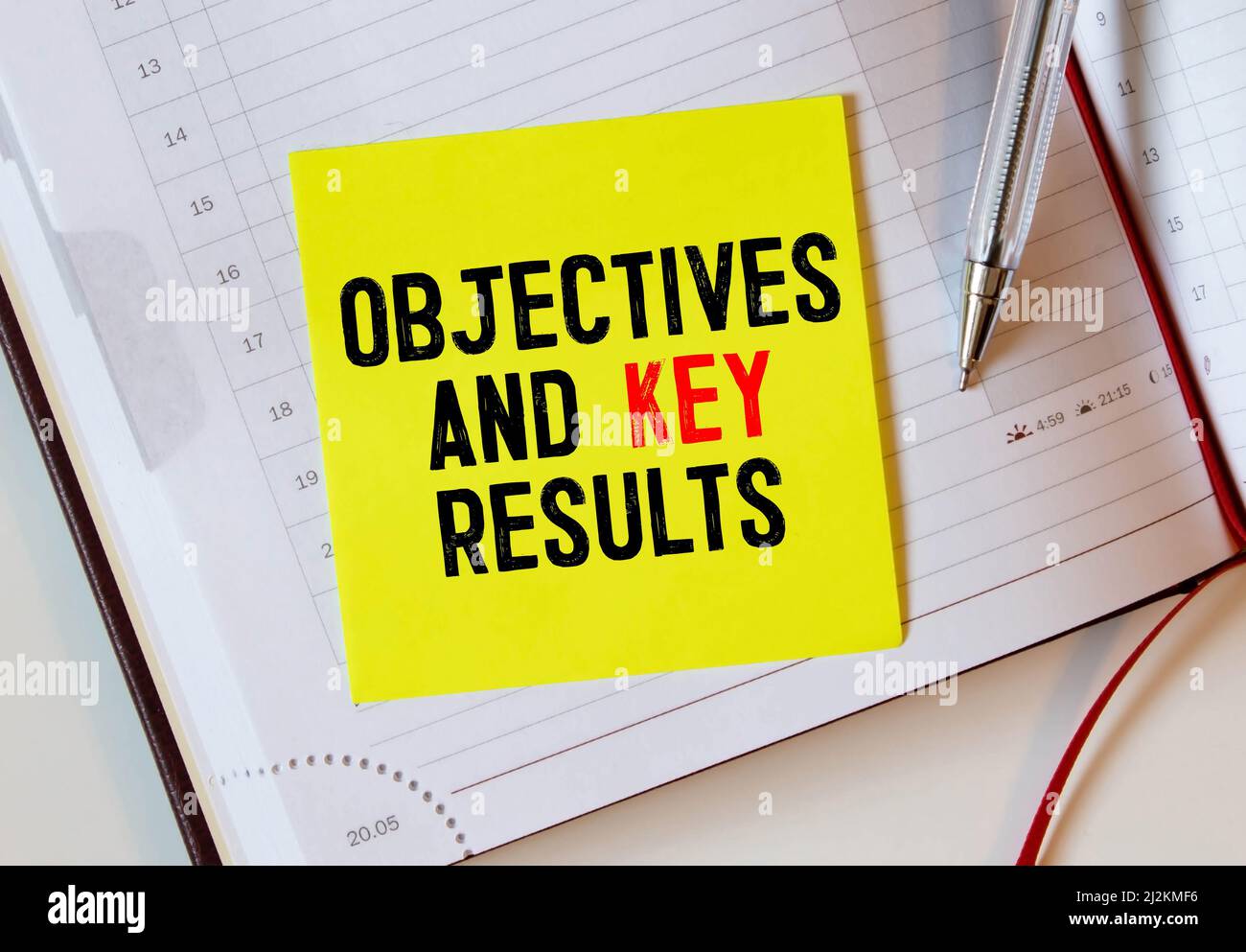 Objective Key Results OKR text in the office notebook. View from above ...