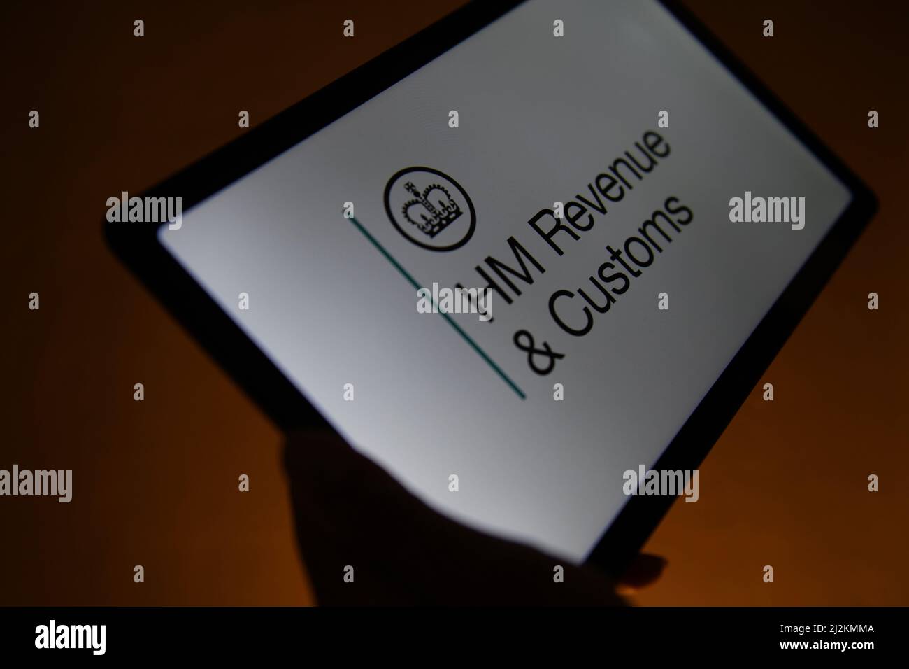 The HM Revenue & Customs logo seen on a tablet Stock Photo - Alamy
