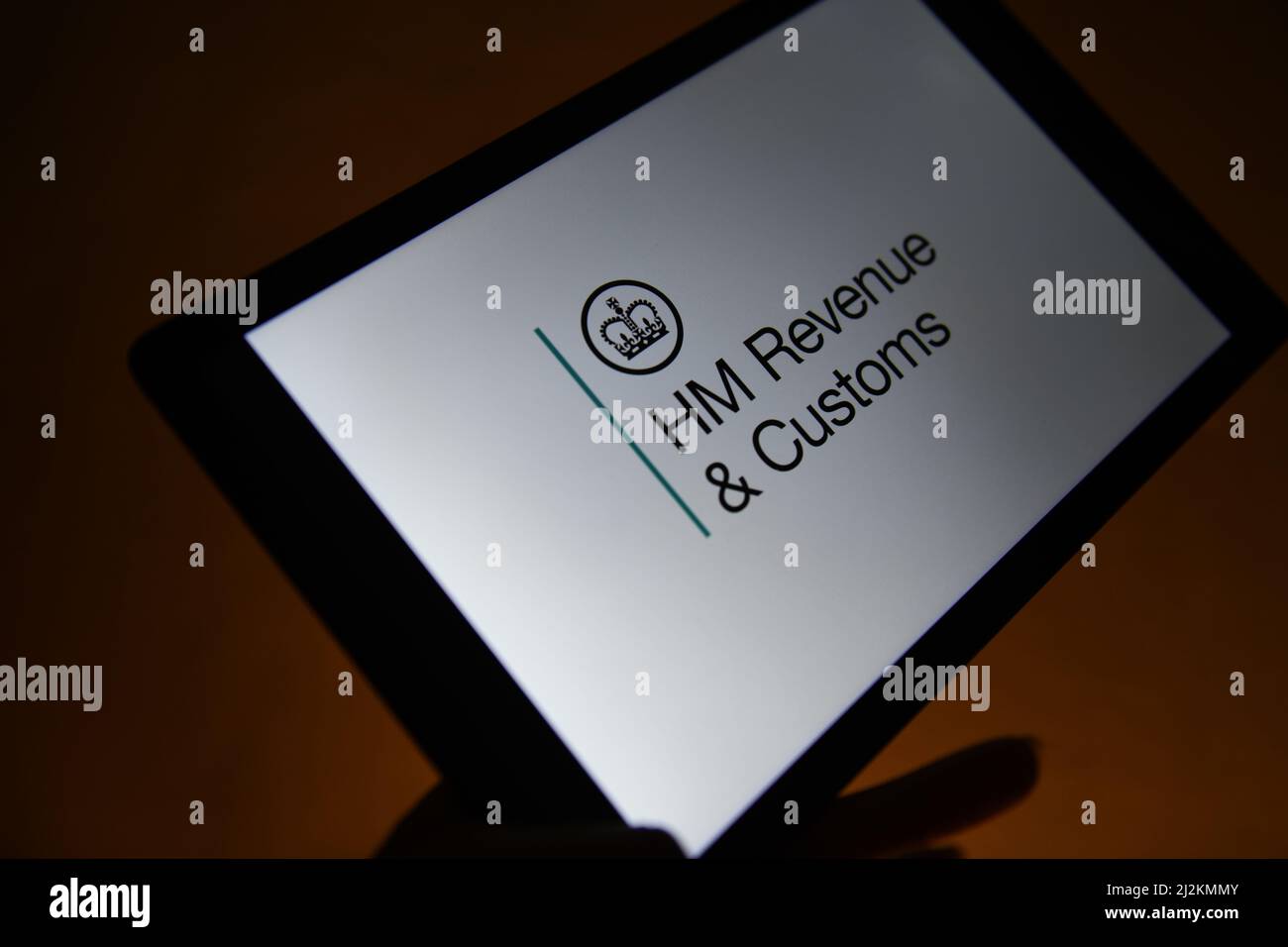 The HM Revenue & Customs logo seen on a tablet Stock Photo - Alamy