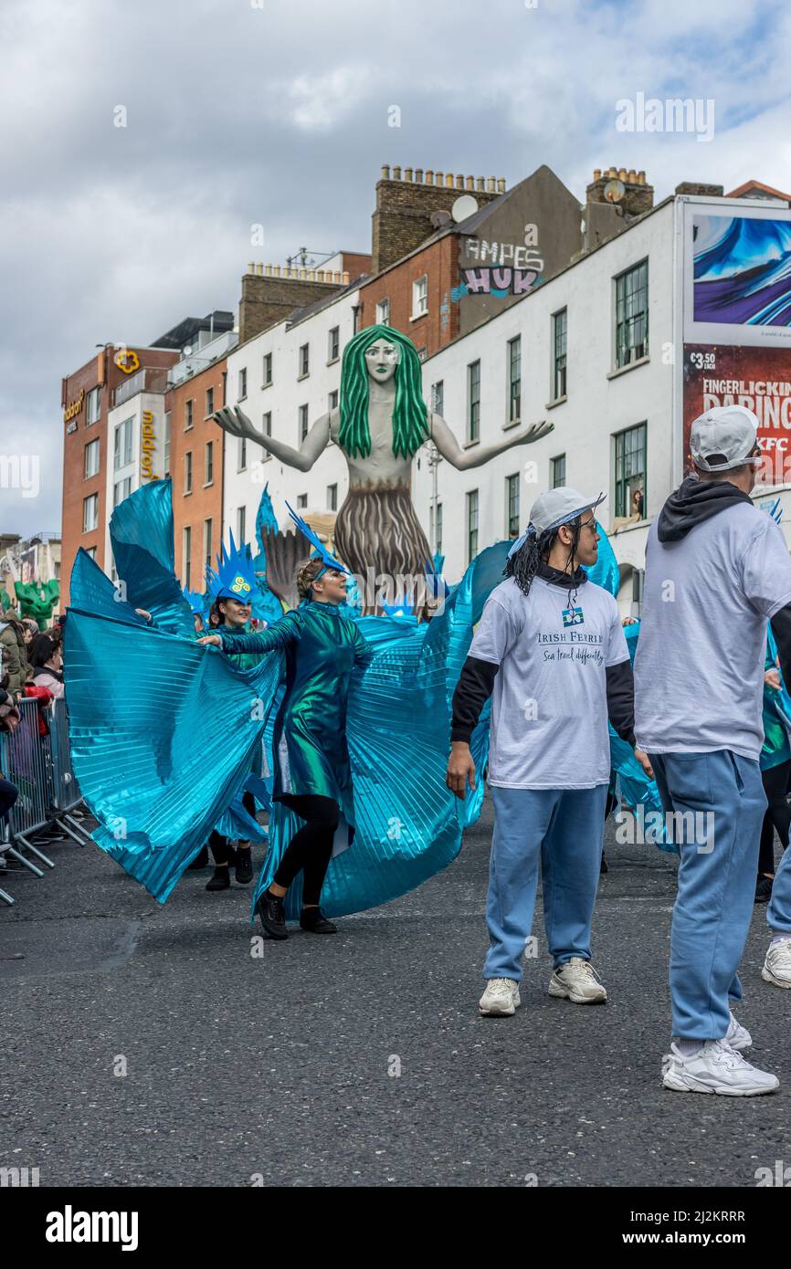 A vertical shot from St Patrick Festival in Dublin with dancers in blue ...