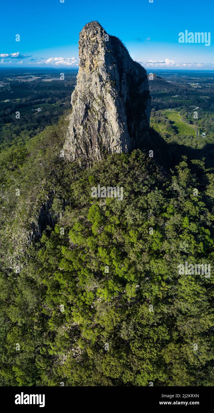 A vertical aerial view of huge high rock among woods Stock Photo - Alamy