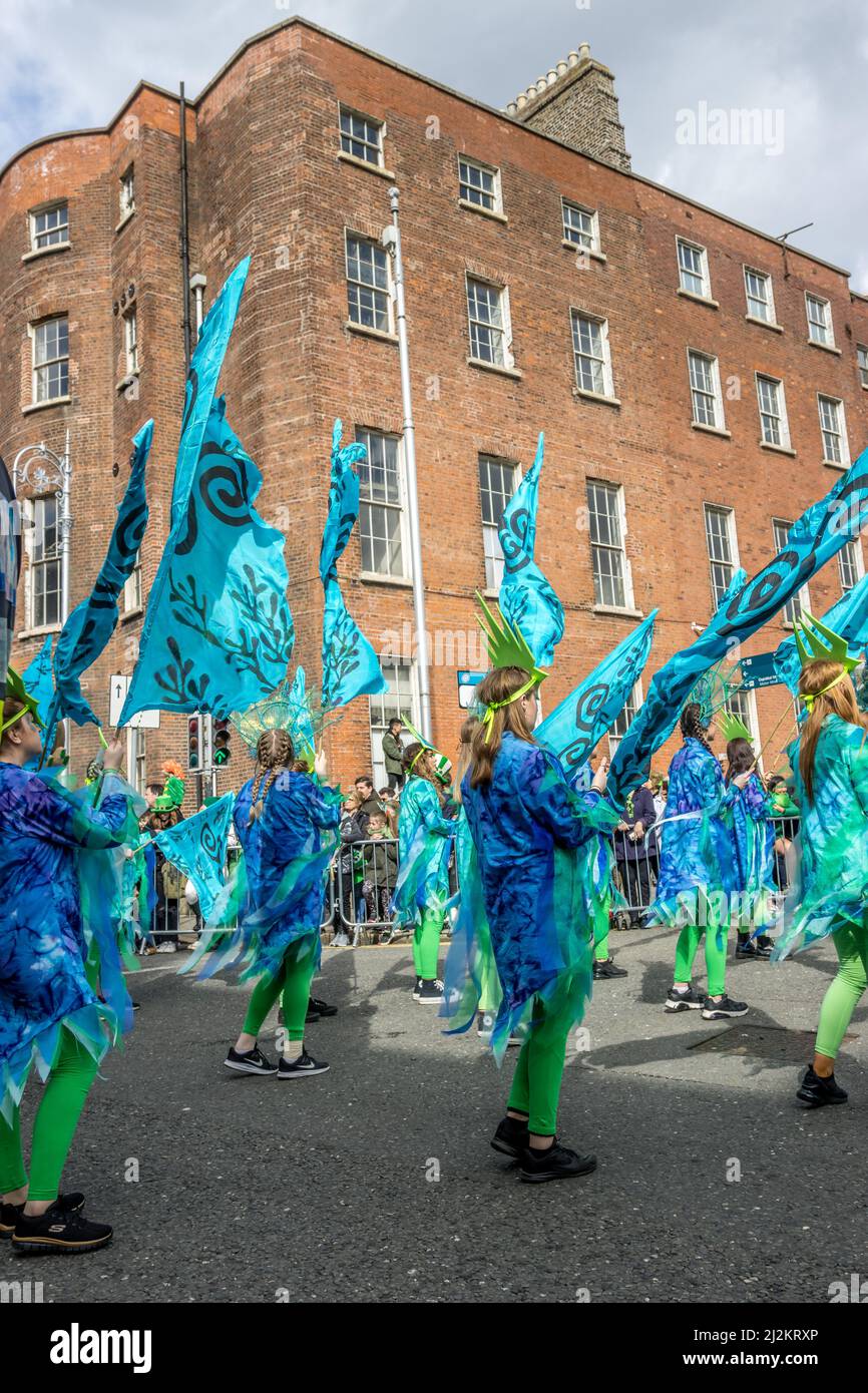 A vertical shot from St Patrick Festival in Dublin with dancers in blue ...