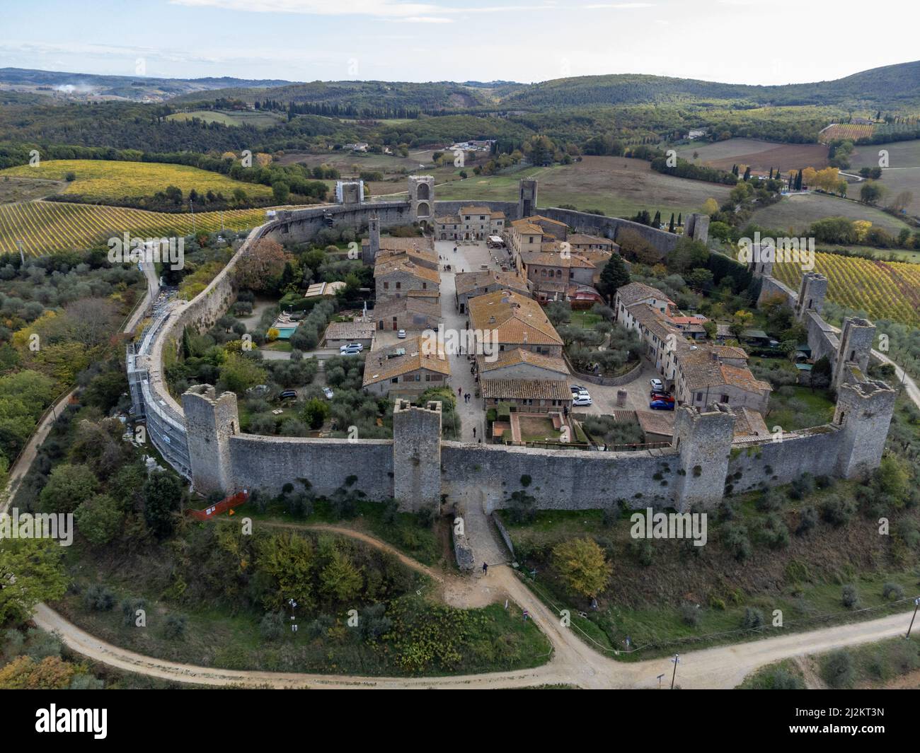 Aeriel view on round medieval fortress town on hilltop Monteriggione in ...