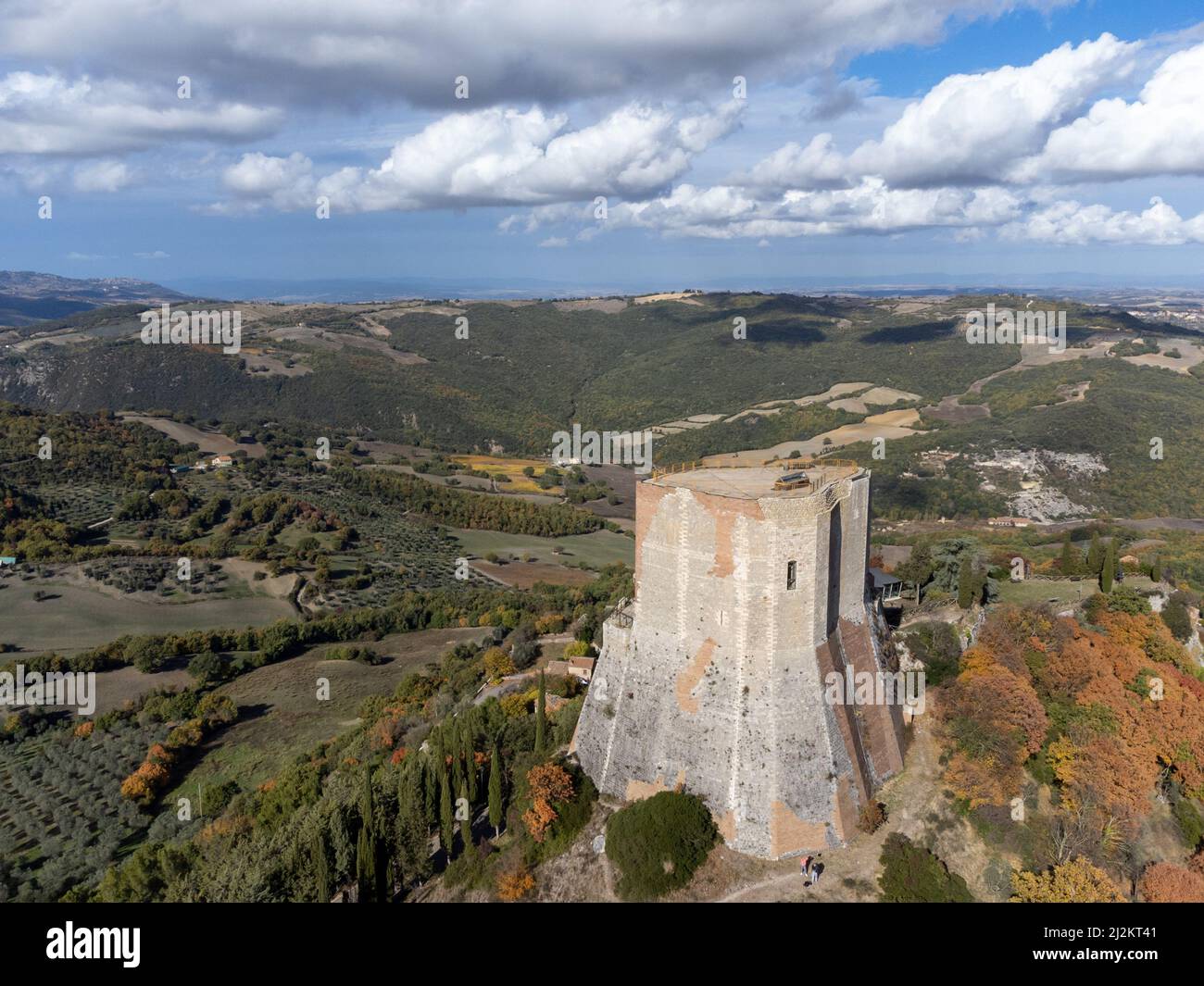 Medieval fortification castle on hilltop and view on hills in Tuscany ...