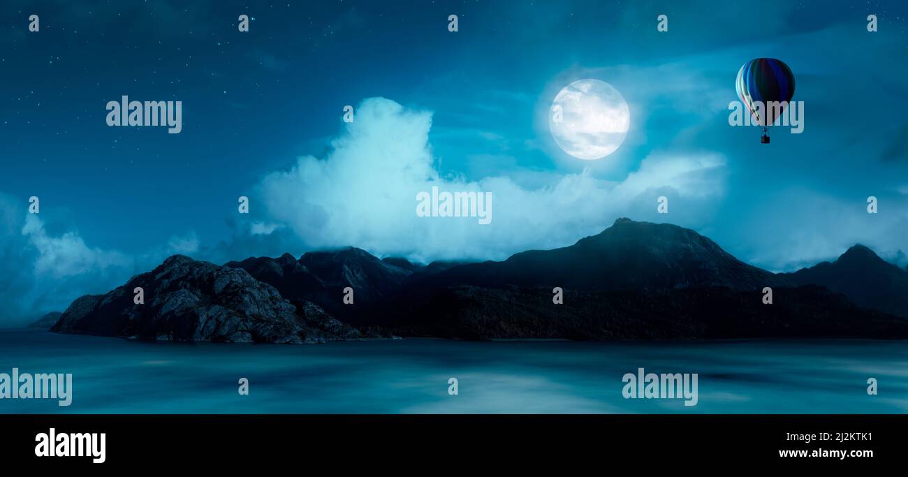 Magical Night Scene with Full Moon in cloudy sky and Hot Air Balloon ...