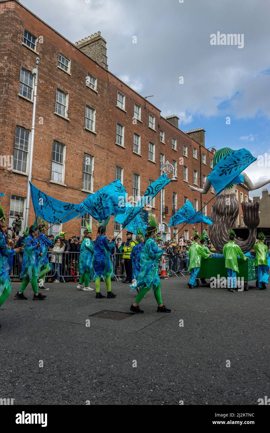 A vertical shot from St Patrick Festival in Dublin with dancers in blue ...