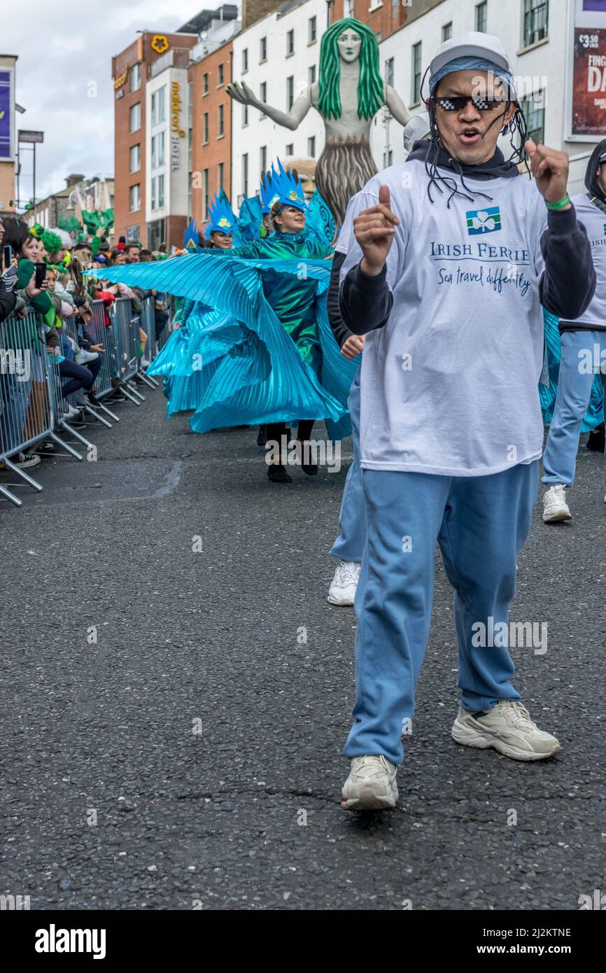 A vertical shot from St Patrick Festival in Dublin with dancers in blue ...