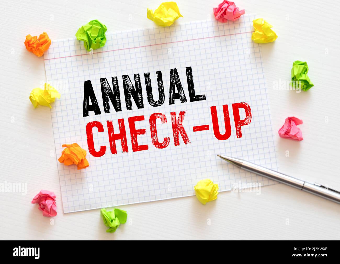 Annual check-up text on paper with blue dumbbell, stethoscope ...