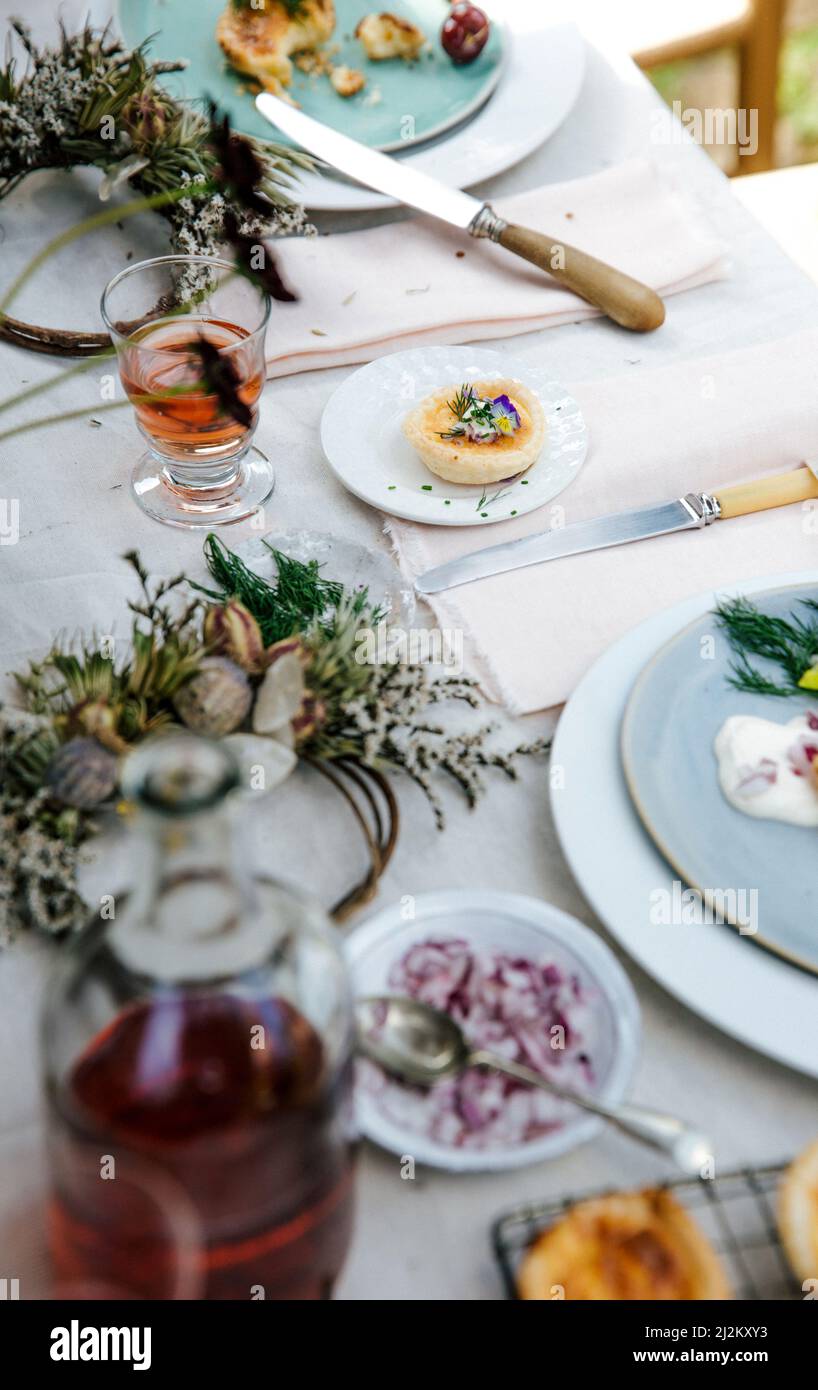 A decorated table for lunch outdoors Stock Photo - Alamy