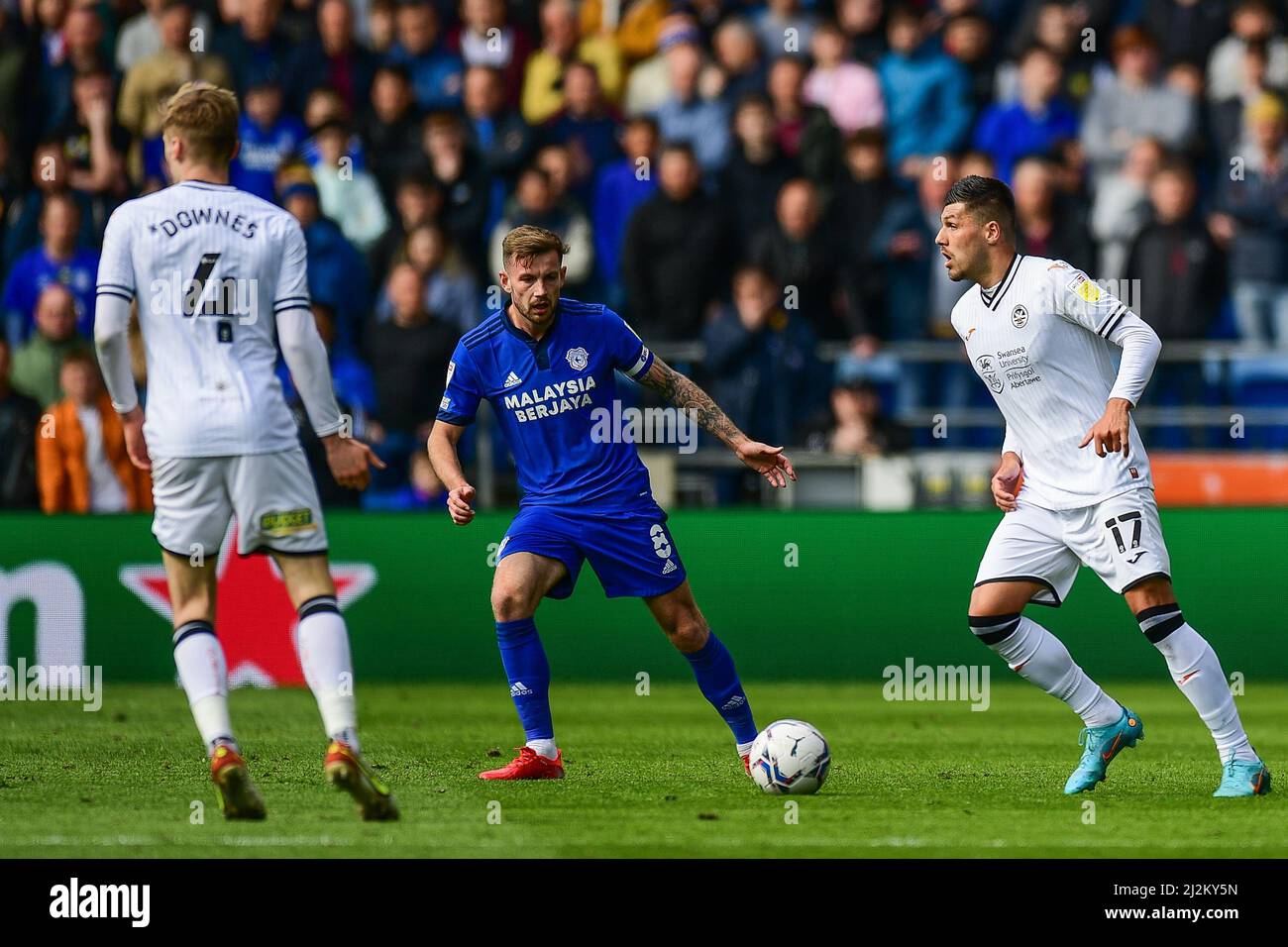 Jo‘l Piroe #17 of Swansea City takes on Joe Ralls #8 of Cardiff City ...