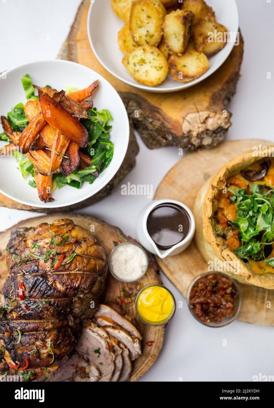 A top view of meat and side dishes with sauces Stock Photo - Alamy