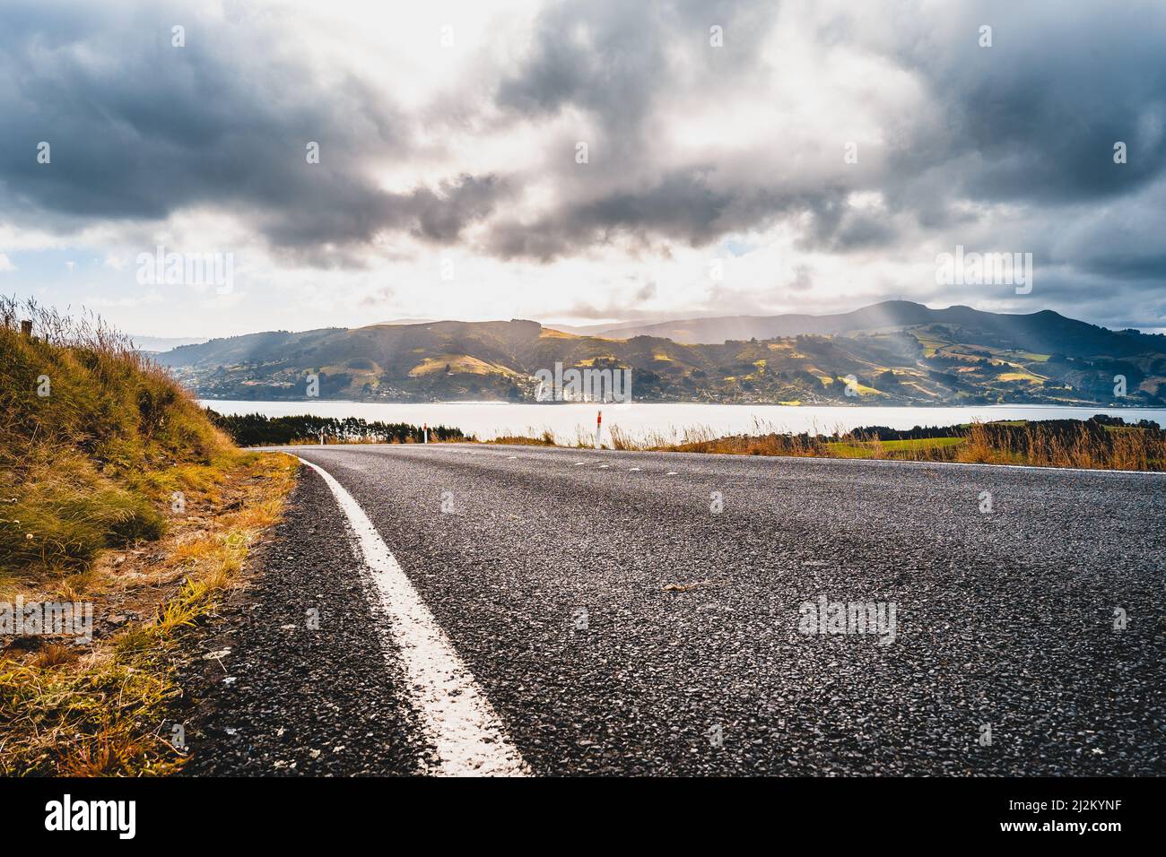 A Highcliffe Road along the ocean in Dunedin, South Island, New Zealand ...