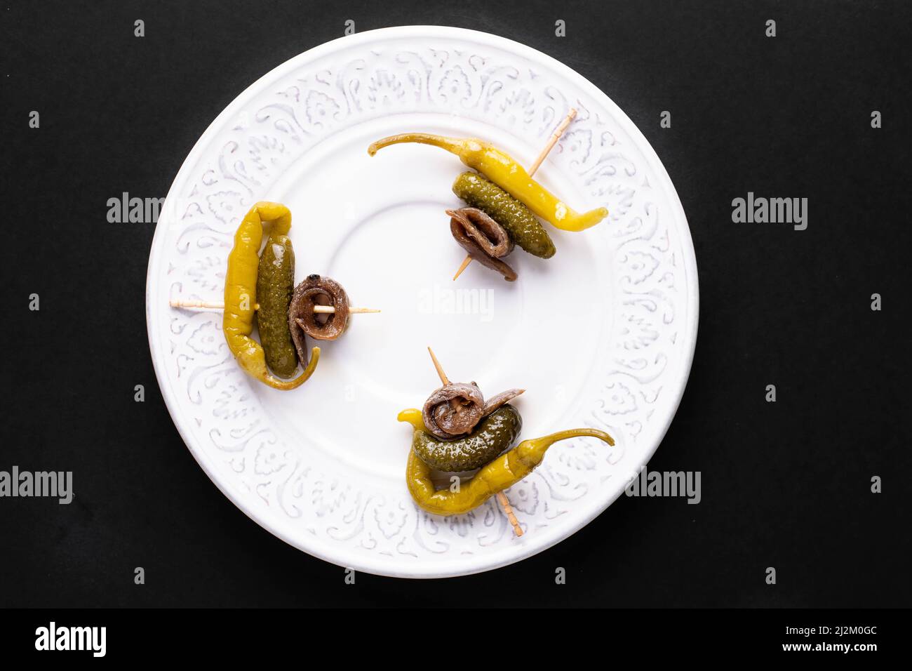 Typical appetiser in Basque country "gilda" made of spicy pepper ...