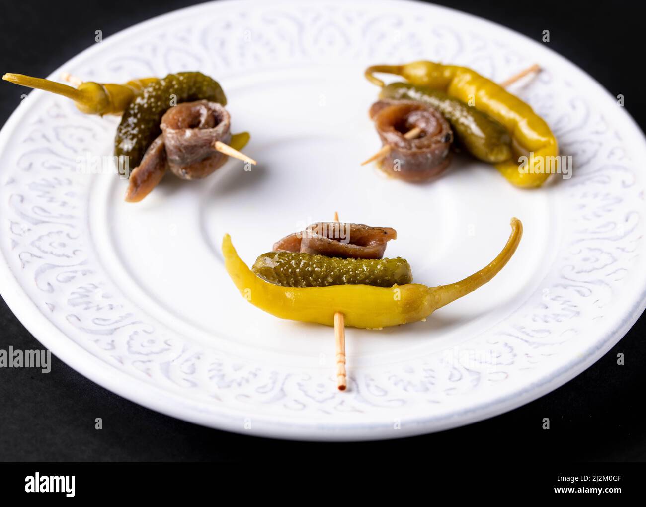 Typical appetiser in Basque country "gilda" made of spicy pepper ...