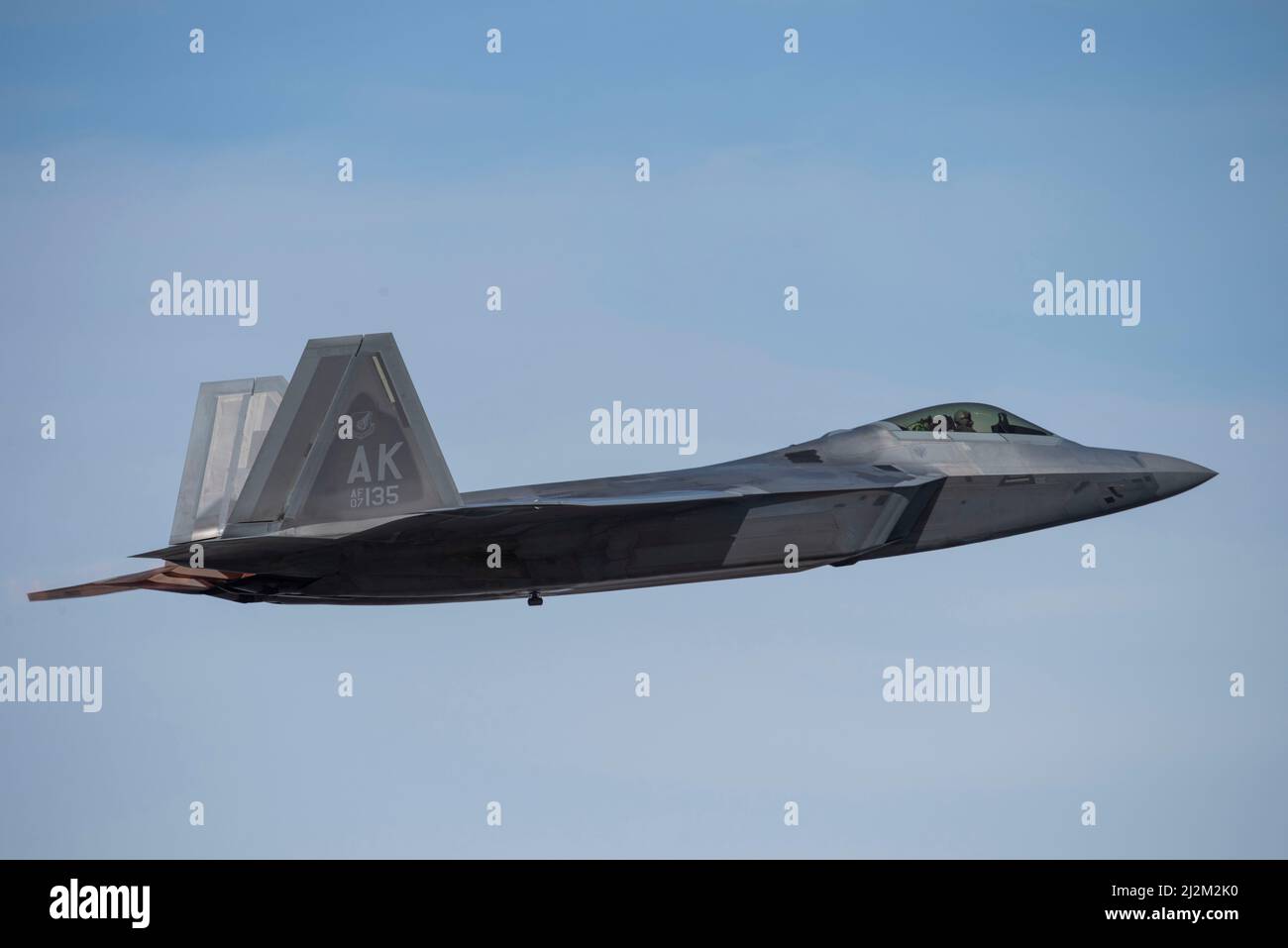 A U.S. Air Force F-22 Raptor assigned to the 3rd Wing flies over Joint ...