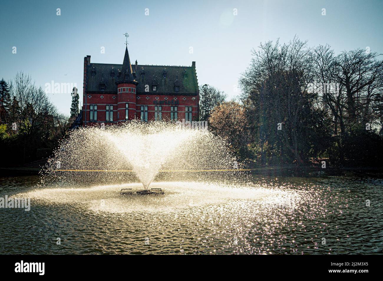 fountain in front of an old castle Stock Photo - Alamy