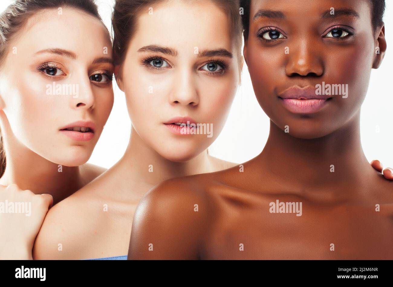 three different nation woman: african-american, caucasian together ...