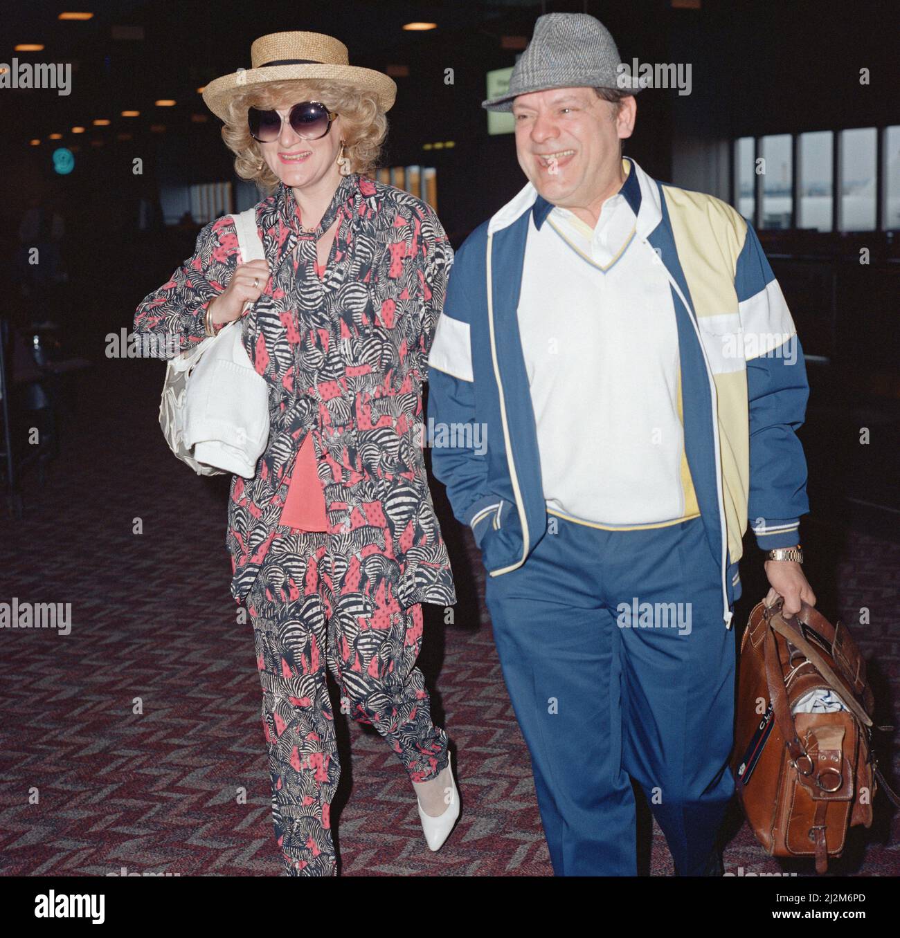 Actor David Jason and girlfriend Myfanwy Talog leaving Heathrow Airport ...