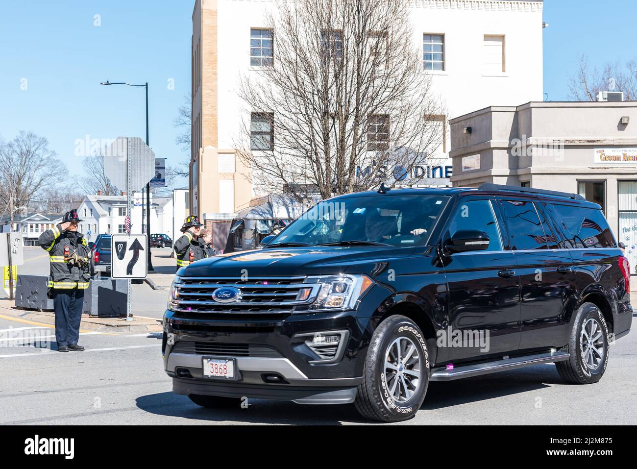 Firemen saluting family SUV in procession for fallen USMC CPT Ross ...
