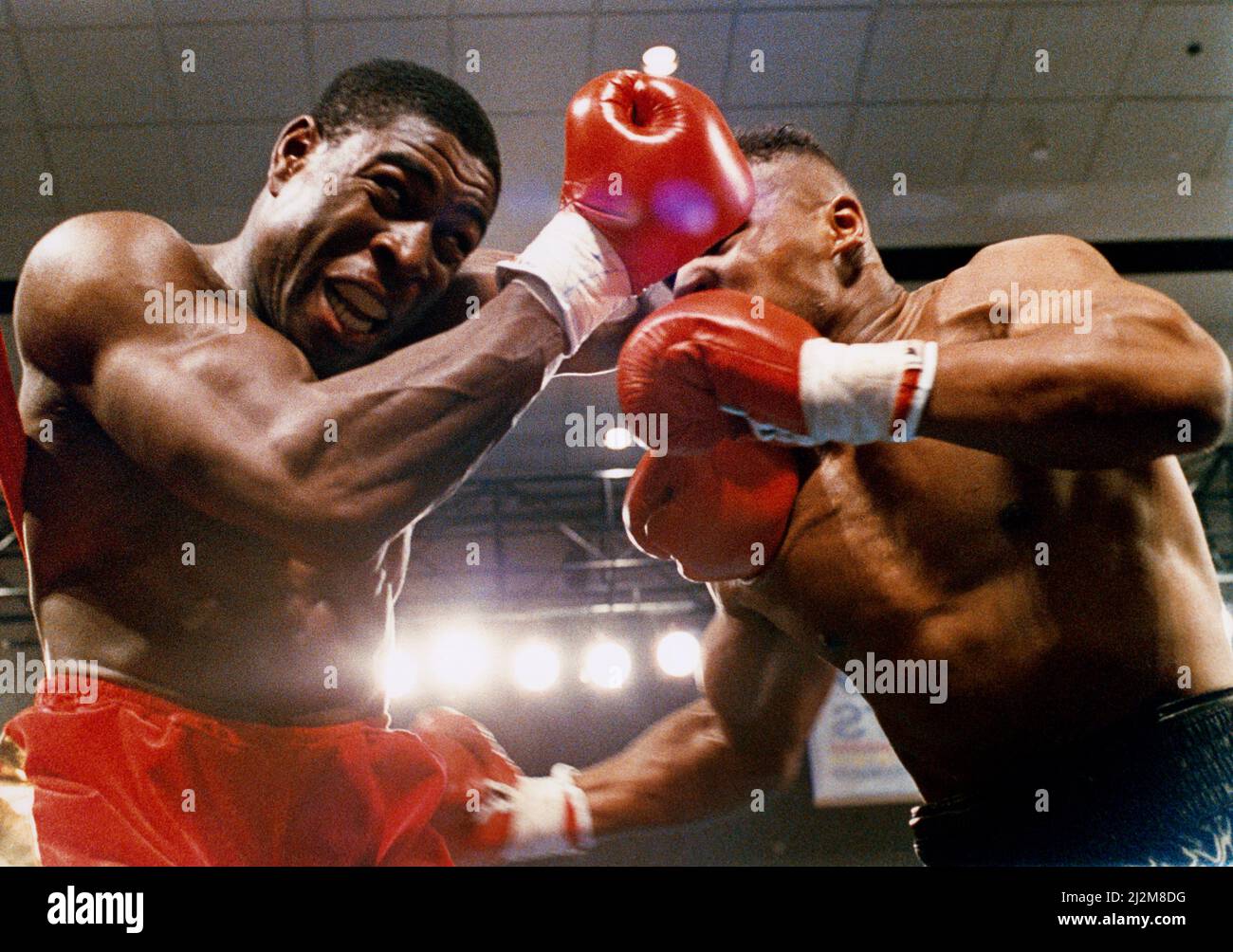 Mike Tyson vs. Frank Bruno for the WBA, WBC, IBF and lineal heavyweight ...