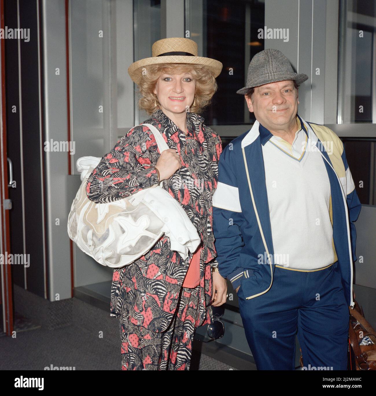 Actor David Jason and girlfriend Myfanwy Talog leaving Heathrow Airport ...