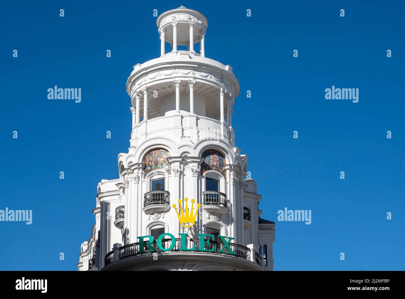 A building displays Swiss luxury watchmaker Rolex brand logo in Spain ...